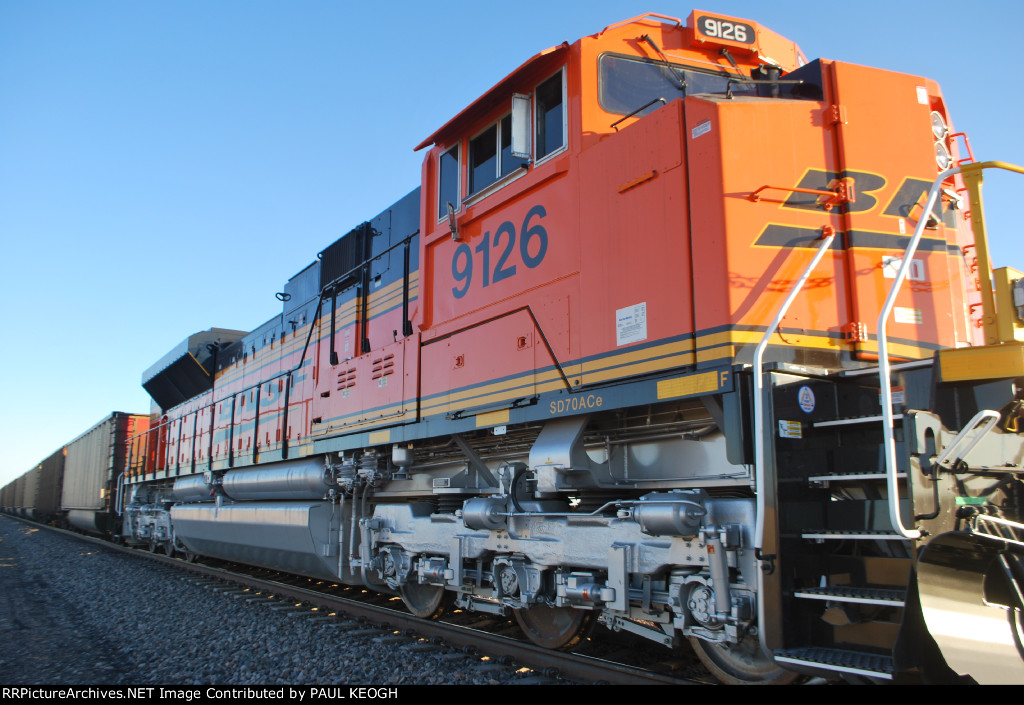 Close in shot of BNSF 9126 and Her Load of Loaded Coal Cars she is pushing.